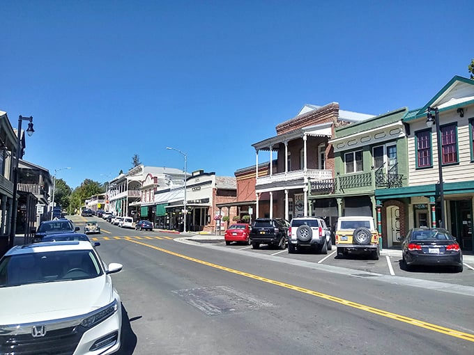 These colorful Victorian storefronts could teach a masterclass in aging gracefully – like Betty White, but with better parking.