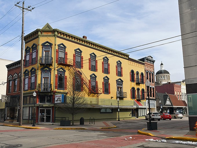 This sunshine-yellow architectural gem anchors downtown with Victorian flair, proving that Huntington doesn't shy away from bold statements or fire escapes.