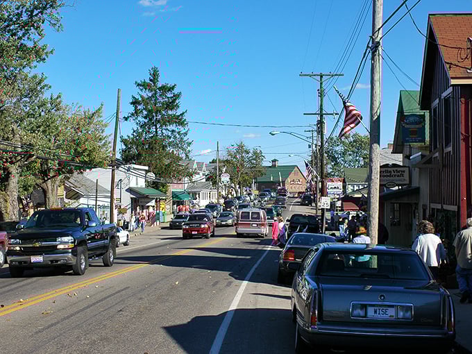 Main Street Berlin: where parking spots accommodate both Cadillacs and carriages. The charming downtown area bustles with a unique blend of tourists and tradition.