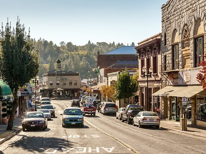 Sunlight bathes downtown Placerville's brick and stone buildings, where modern cars cruise the same streets once filled with gold-seeking prospectors.