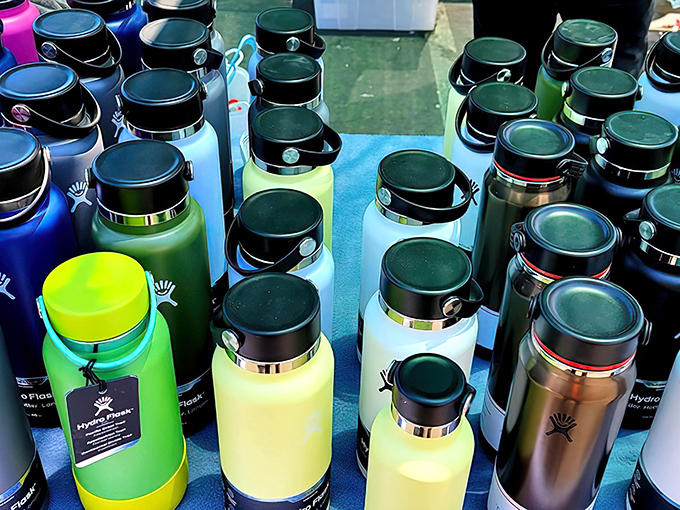 A rainbow of hydration options stands at attention – proof that even water bottles can spark joy in the right colors.