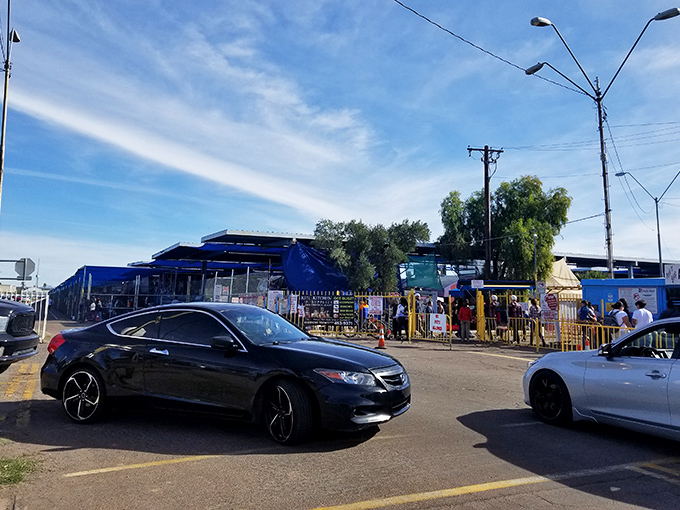 Blue skies and bargain hunters – the entrance to Phoenix's ultimate treasure hunt draws a steady stream of cars filled with hopeful shoppers.