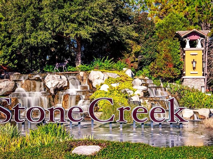 Nature and architecture in perfect harmony. This entrance waterfall doesn't just say "welcome home" – it whispers "you've made it."