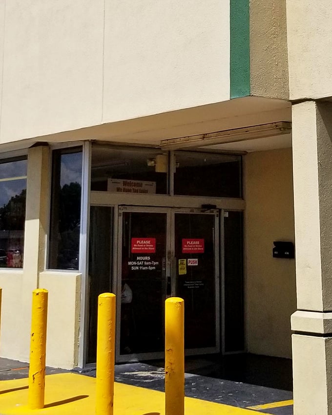 Yellow safety bollards stand guard at the entrance like sentinels of savings. They seem to say, "Prepare your wallet for mercy—it's about to get a much-needed break."