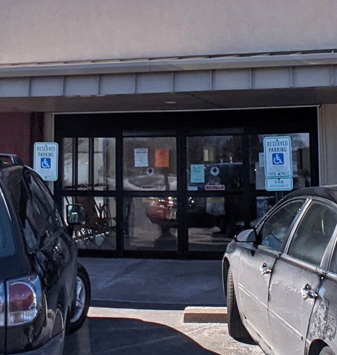 Every entrance to a thrift store is a portal to possibility—you never know what forgotten treasures await just beyond those glass doors.