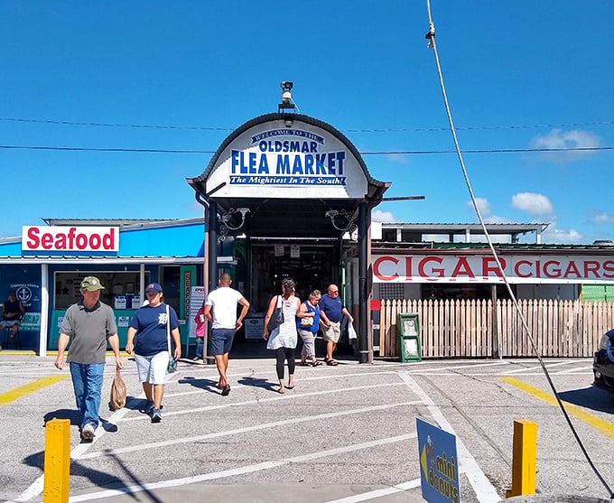 Shoppers stream through the main entrance where seafood and cigars frame your gateway to endless possibilities.