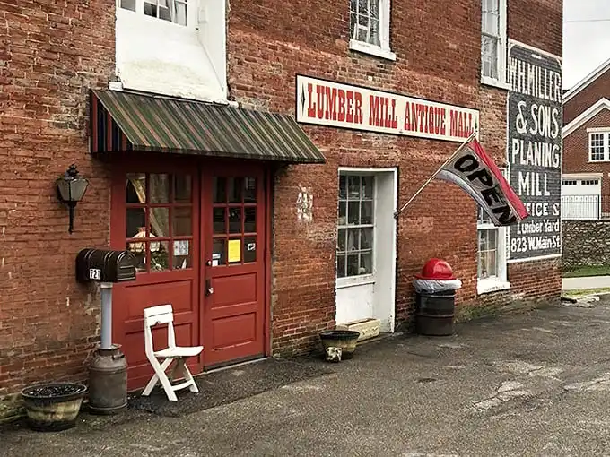 Those iconic red doors aren't just an entrance—they're a portal to the past. The vintage "OPEN" flag might as well say "Abandon all shopping lists, ye who enter here."