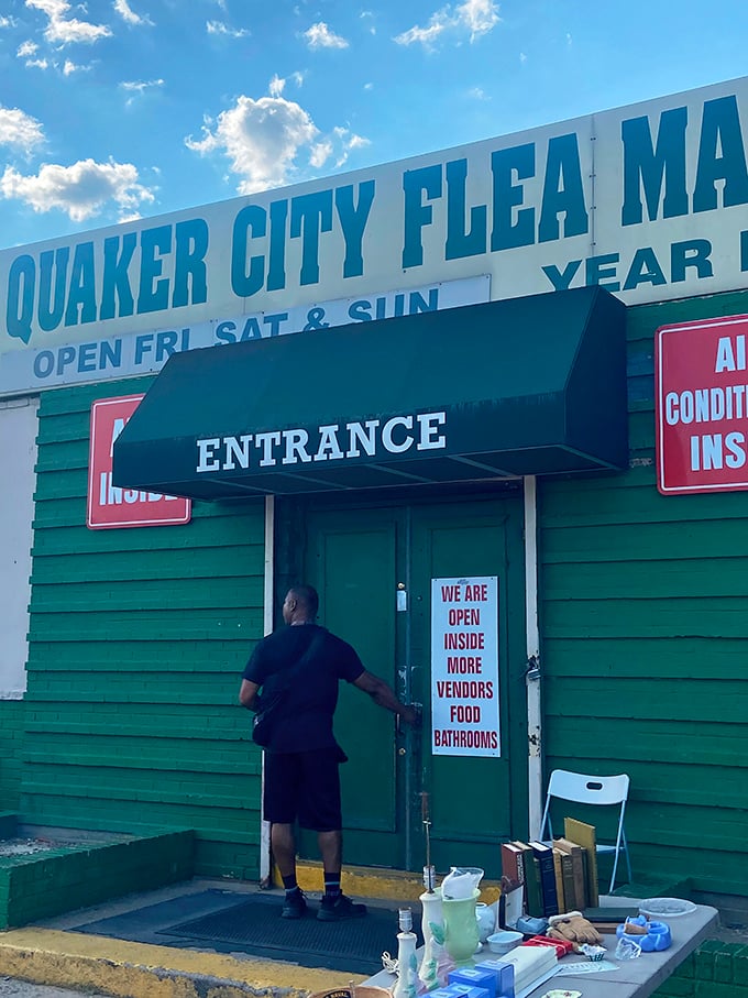 The unassuming green entrance belies the wonderland of bargains waiting inside – like a portal to a parallel universe of possibilities.