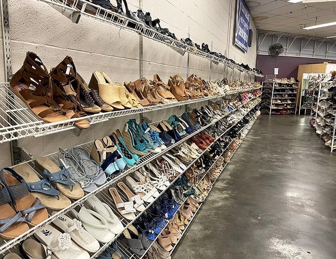 Shoe heaven or footwear museum? Row after row of potential glass slippers await their Cinderellas, organized with a precision that would make Marie Kondo weep with joy.
