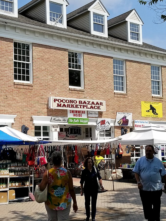 The classic brick façade of Pocono Bazaar stands like a temple to retail serendipity, where shoppers pilgrimage for the thrill of the unexpected find.