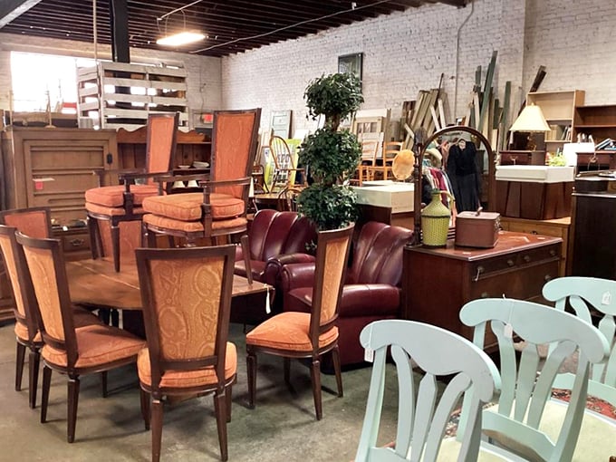 Mid-century dining elegance meets bohemian comfort in this furniture tableau – where every chair has a story waiting to be continued.