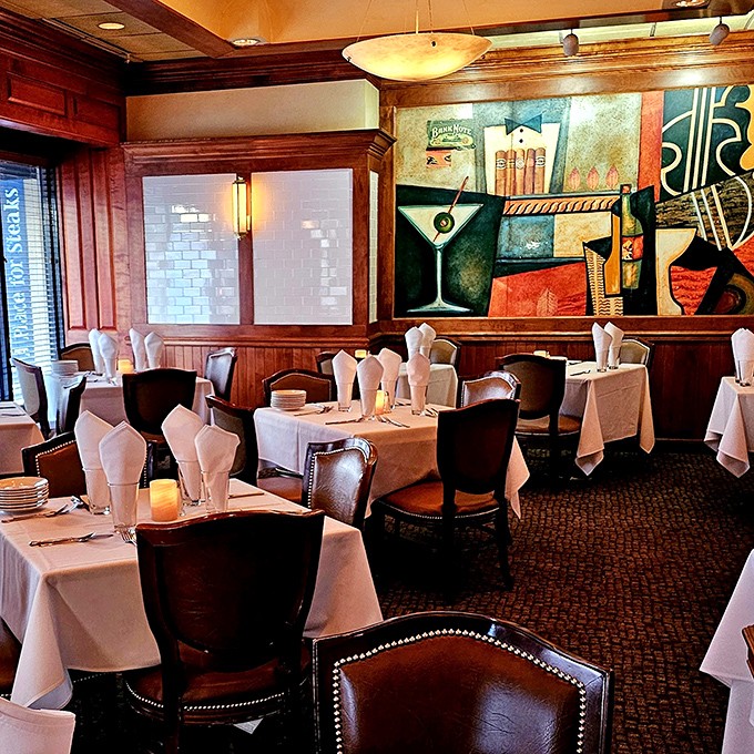 Classic steakhouse elegance meets artistic flair. The martini-themed artwork reminds you that some partnerships—like steak and cocktails—are simply meant to be.