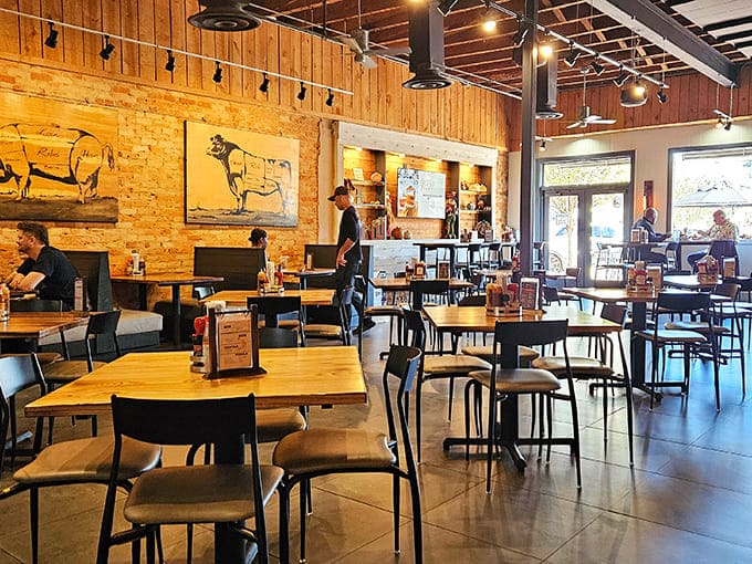 Inside, rustic meets refined with exposed brick walls, wooden accents, and farm animal artwork that reminds you exactly what you're here to celebrate.