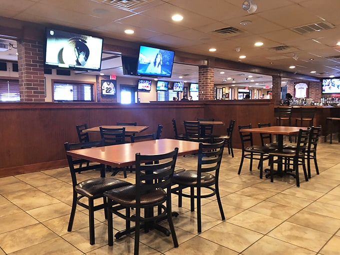 Classic sports bar ambiance meets comfortable dining – where every seat offers a view of the game and proximity to those legendary mozzarella sticks.