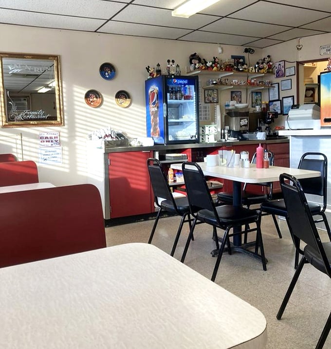 Inside, the classic diner aesthetic welcomes you like an old friend. Those Mickey Mouse collectibles aren't just decoration—they're conversation starters for strangers soon to become breakfast buddies.
