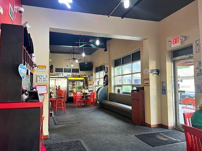 Red chairs and simple tables say, "We're not fancy, but our food is legendary." The kind of place where memories are made between bites.