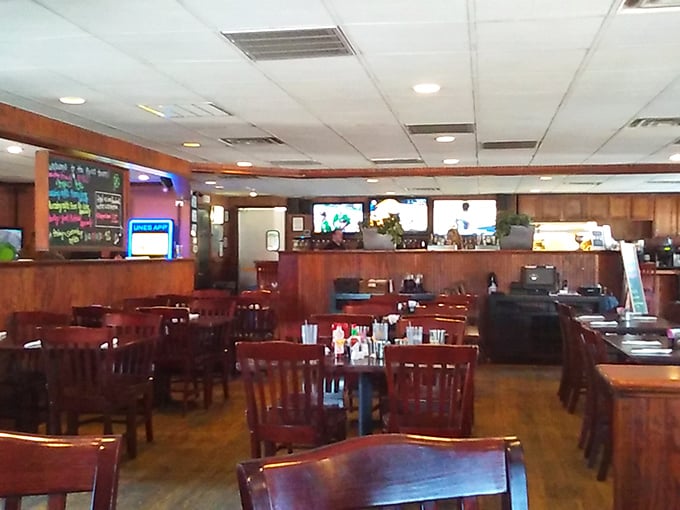 Warm wood paneling and sturdy furniture create that "everybody knows your name" vibe—minus the Boston accent, plus Southern hospitality.