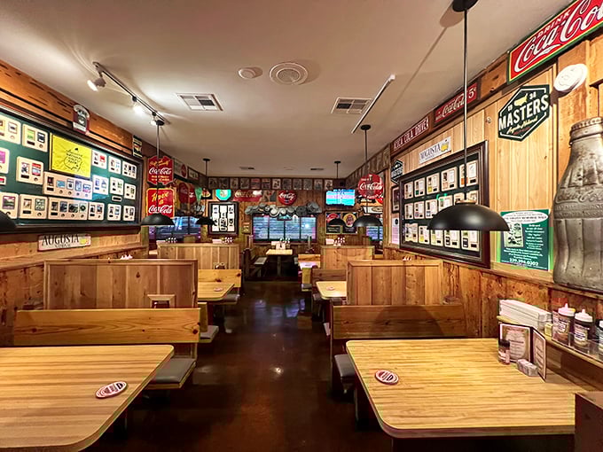 Wood-paneled walls and vintage signs create the perfect backdrop for serious barbecue business – no pretense, all flavor.