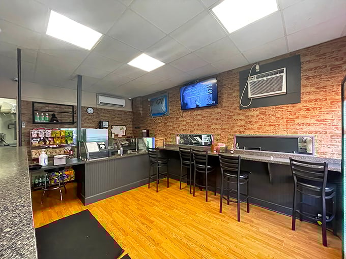 Exposed brick walls and no-nonsense seating tell you everything: this place prioritizes substance over style. Your stomach will thank you.