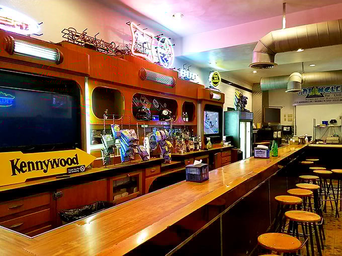 Step inside and you're transported to a classic Pittsburgh bar where the polished wood counter has witnessed decades of sandwich appreciation and Steelers celebrations.