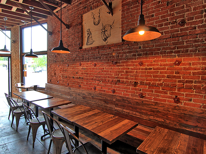 Exposed brick walls and wooden tables create that perfect "I'm about to eat something serious" atmosphere that every great BBQ joint needs.