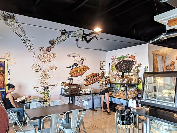 Whimsical murals transform simple walls into a bread lover's fantasy world, where cartoon characters dive into sandwiches with the enthusiasm we all secretly feel.