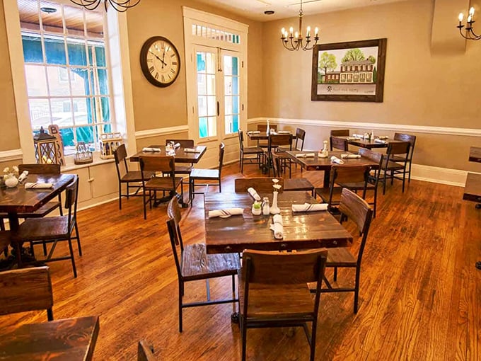 Warm wooden floors, elegant chandeliers, and tables that invite lingering conversations—this dining room feels like the living room of your most sophisticated friend.