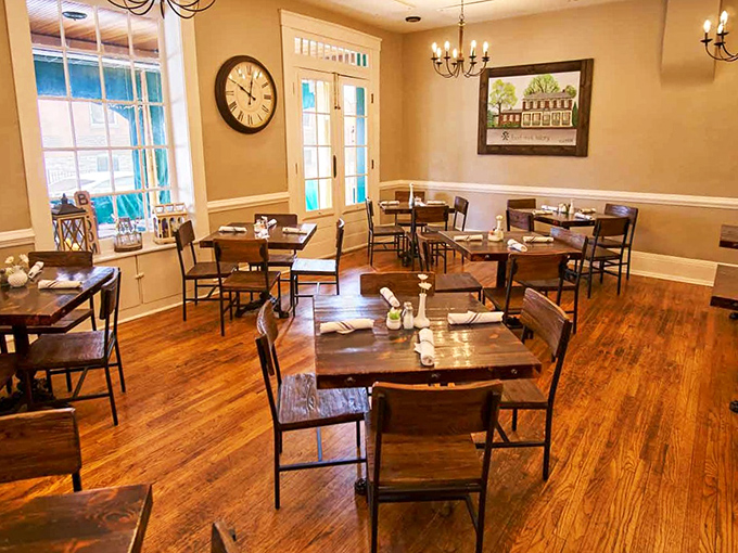 Warm wooden floors, elegant chandeliers, and tables that invite lingering conversations—this dining room feels like the living room of your most sophisticated friend.