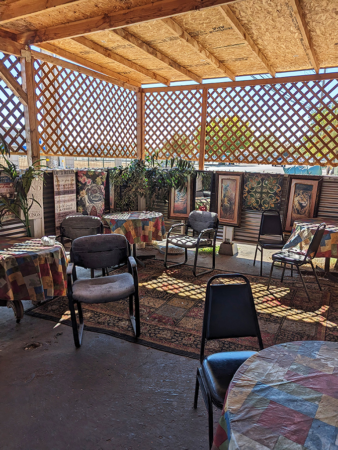 The covered patio creates an intimate dining experience where strangers become friends over exceptional soul food.