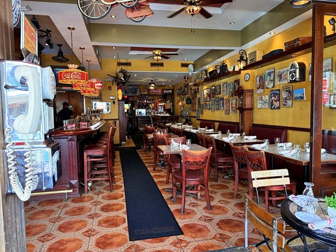 Step inside and time travels backward – yellow walls adorned with memorabilia create the perfect backdrop for culinary memories in the making.