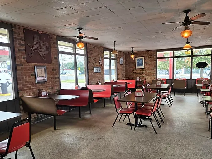 Red vinyl booths and brick walls create the perfect backdrop for conversations that flow as easily as the milkshakes.