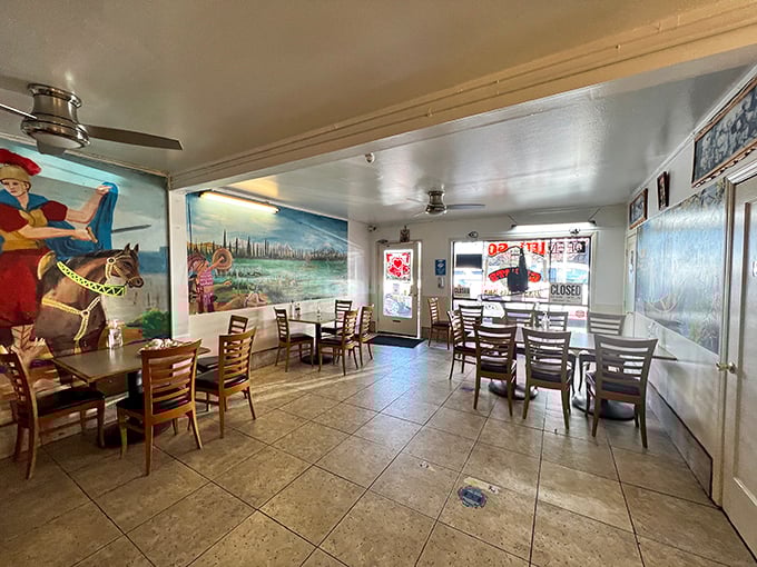 Simple tables, ceiling fans, and colorful murals of Mexican landscapes create an unpretentious backdrop where the food becomes the undisputed star.