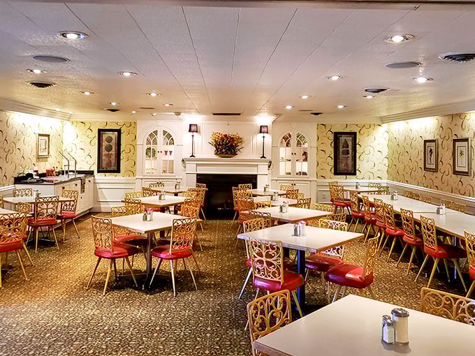 Step inside and you're transported to the golden age of dining – ornate chairs, patterned wallpaper, and a fireplace that says "stay awhile, the calories are worth it."