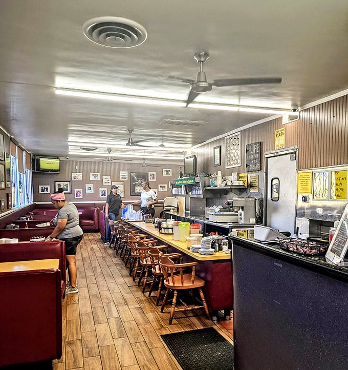 Classic diner vibes meet Southern hospitality in burgundy booths where conversations flow like maple syrup.