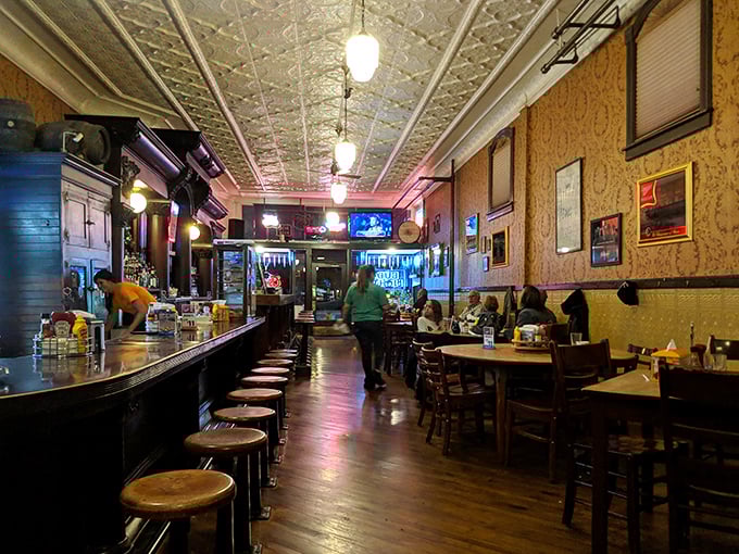 Step inside and time slows down – the pressed tin ceiling, wooden bar, and warm lighting create the kind of atmosphere money can't manufacture.