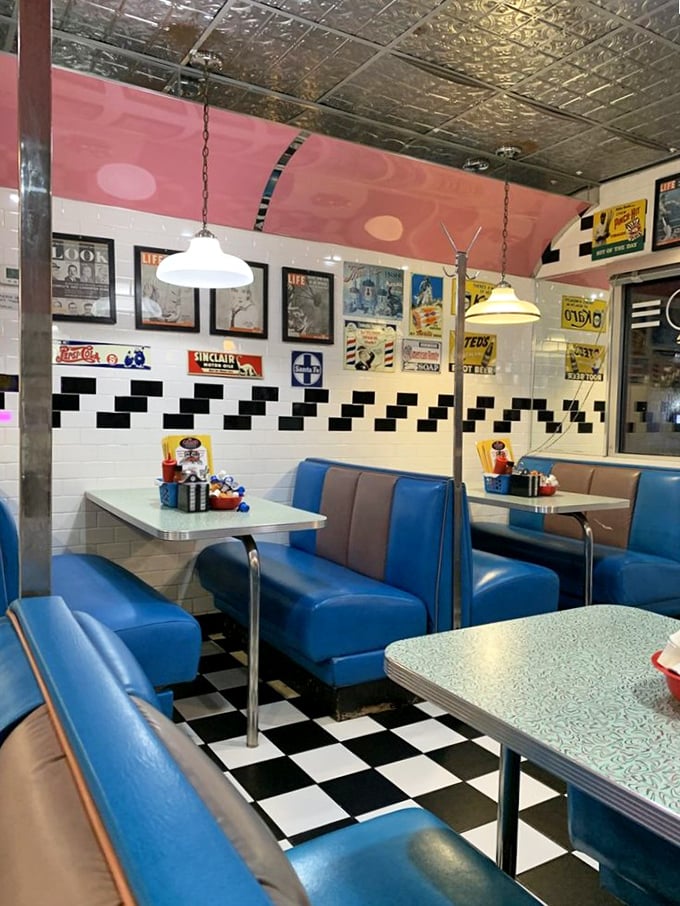 Blue vinyl booths and checkered floors transport you to simpler times, when conversations happened face-to-face and phones were attached to walls.