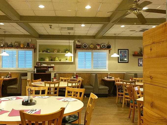 Wooden chairs, cozy booths, and shelves adorned with homey touches—this is what breakfast dreams are made of.