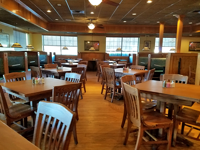 Wooden chairs, cozy booths, and warm lighting create that perfect "everybody knows your name" vibe—minus Norm and Cliff arguing at the bar.
