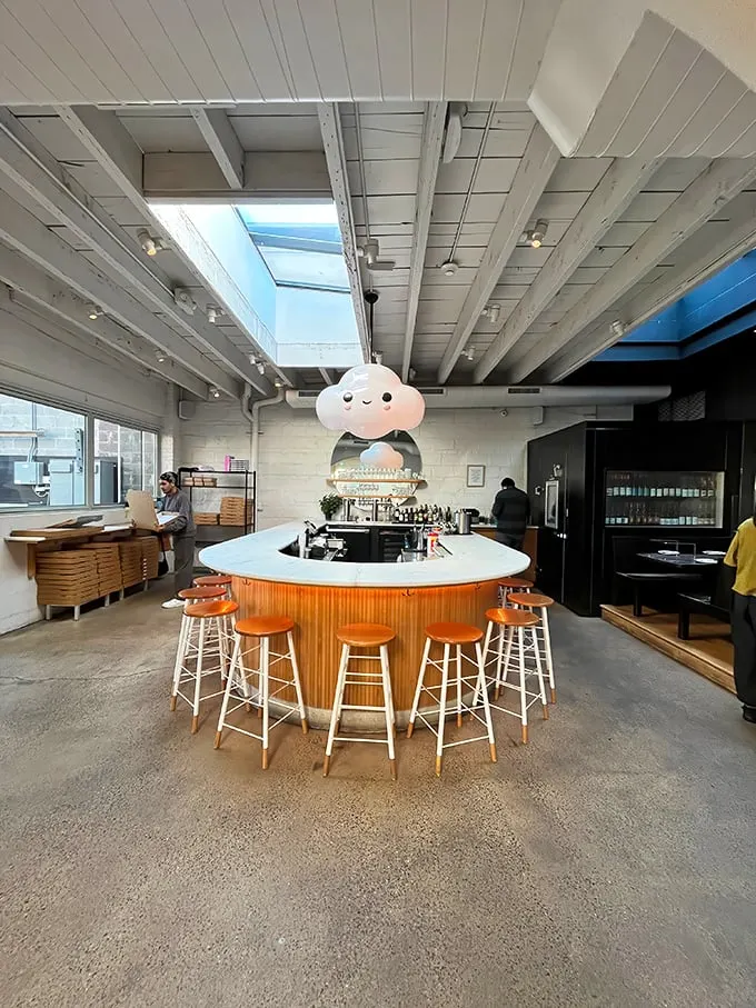 That adorable cloud hanging over the bar isn't just decoration—it's foreshadowing the heavenly experience your taste buds are about to have.