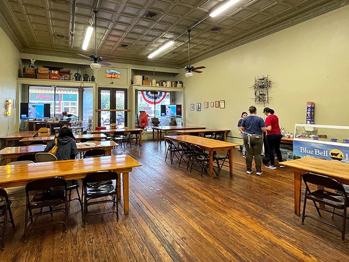 Simple wooden tables and fluorescent lights create the perfect no-nonsense barbecue cathedral atmosphere.