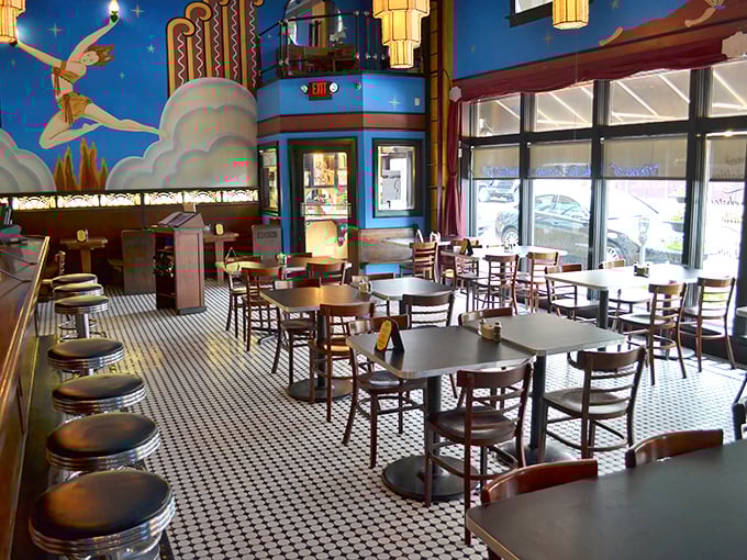 Step inside and you're transported to another era—vibrant murals, classic tile floors, and lighting that makes everyone look like a movie star.