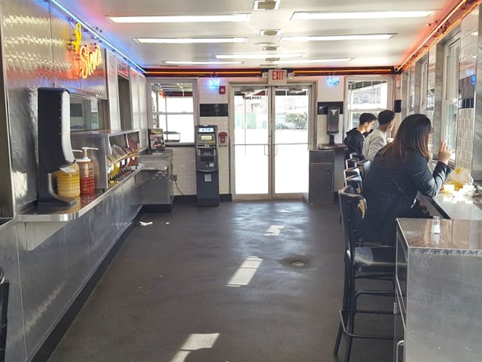 Inside, the no-nonsense interior tells you everything: this place isn't about ambiance—it's about getting exceptional cheesesteaks into hungry hands with military precision.
