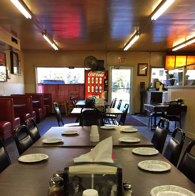 Where fluorescent lighting meets vinyl booths and paper plates—a reminder that the most memorable dining experiences often happen in places where ambiance takes a backseat to flavor.