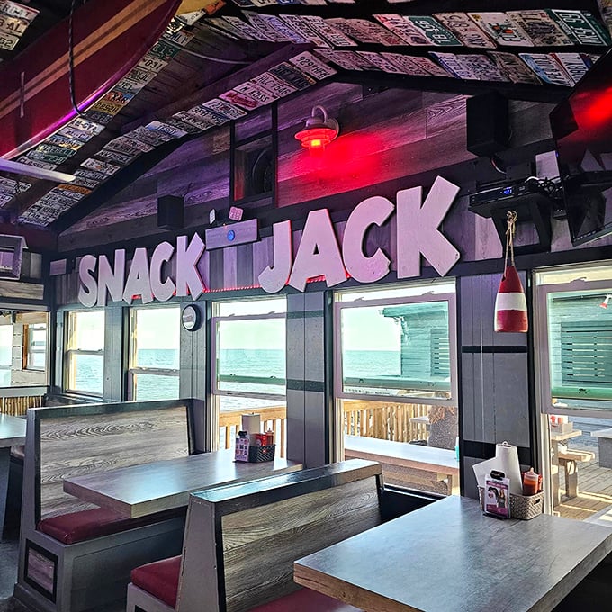 Where dollar bills decorate the ceiling and ocean views steal the show. This isn't just dining—it's front-row seats to nature's greatest performance.