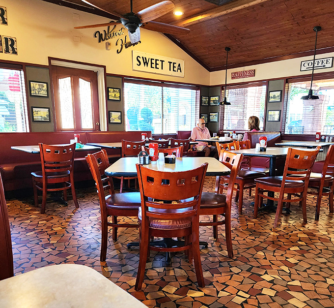 Wooden ceiling beams, hexagonal tile floors, and "Sweet Tea" signs—this isn't just a diner, it's a time machine.
