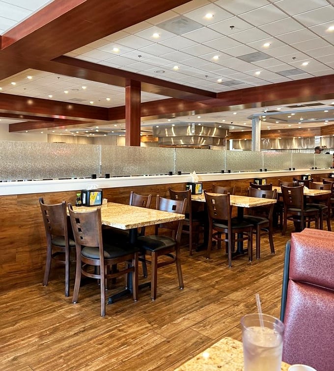 Warm wood tones and comfortable seating create the perfect backdrop for multiple trips to the buffet line. Your stomach is already thanking you.