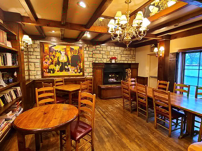 Wooden beams, stone walls, and that fireplace—this isn't just dining, it's time travel to a countryside bistro where conversations linger longer than the coffee.