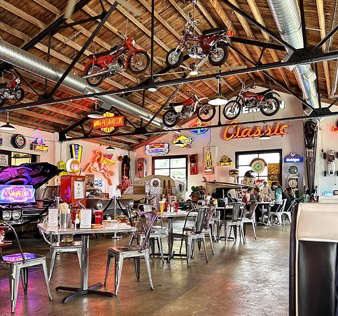 Vintage motorcycles suspended from wooden rafters create the ultimate "look up" moment – it's like Easy Rider met a food lover and decided to settle down.