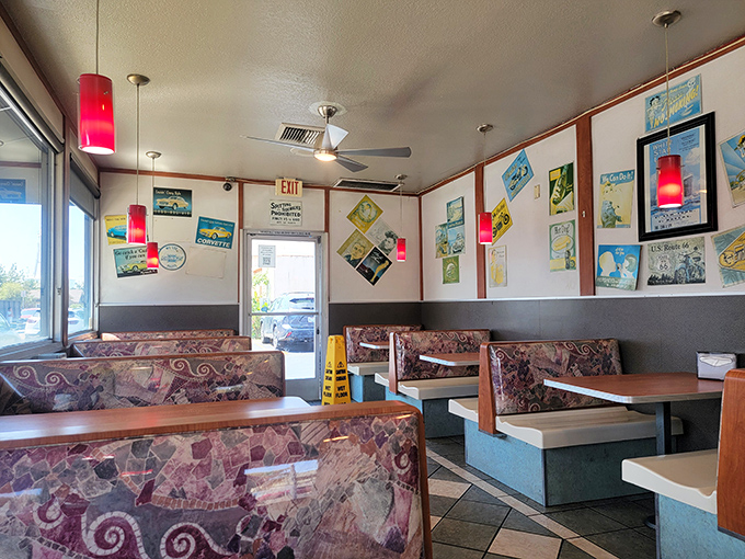Inside, those red pendant lights and vintage-patterned booths aren't trying to be retro—they actually are retro, unchanged since your parents' first date.