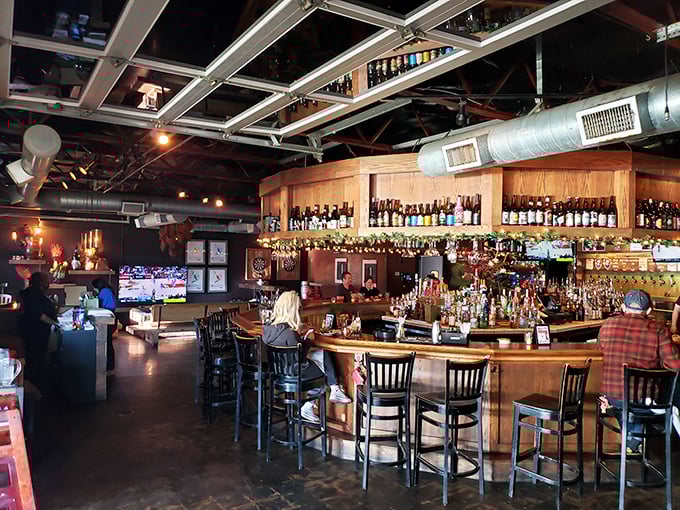 The warm wooden bar, stocked with an impressive array of bottles, feels like the living room you wish you had—if your living room served perfect pints.
